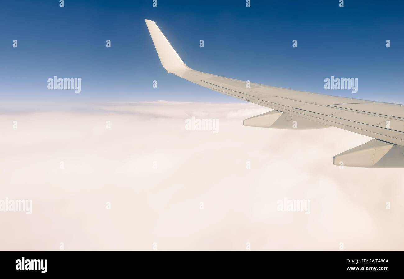White wing from airplane window on sunny day. Great views of landscape ...
