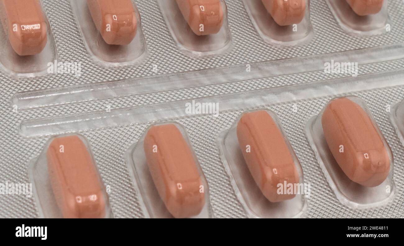 Macro shot pile of tablets pill in silver blister packaging texture on ...