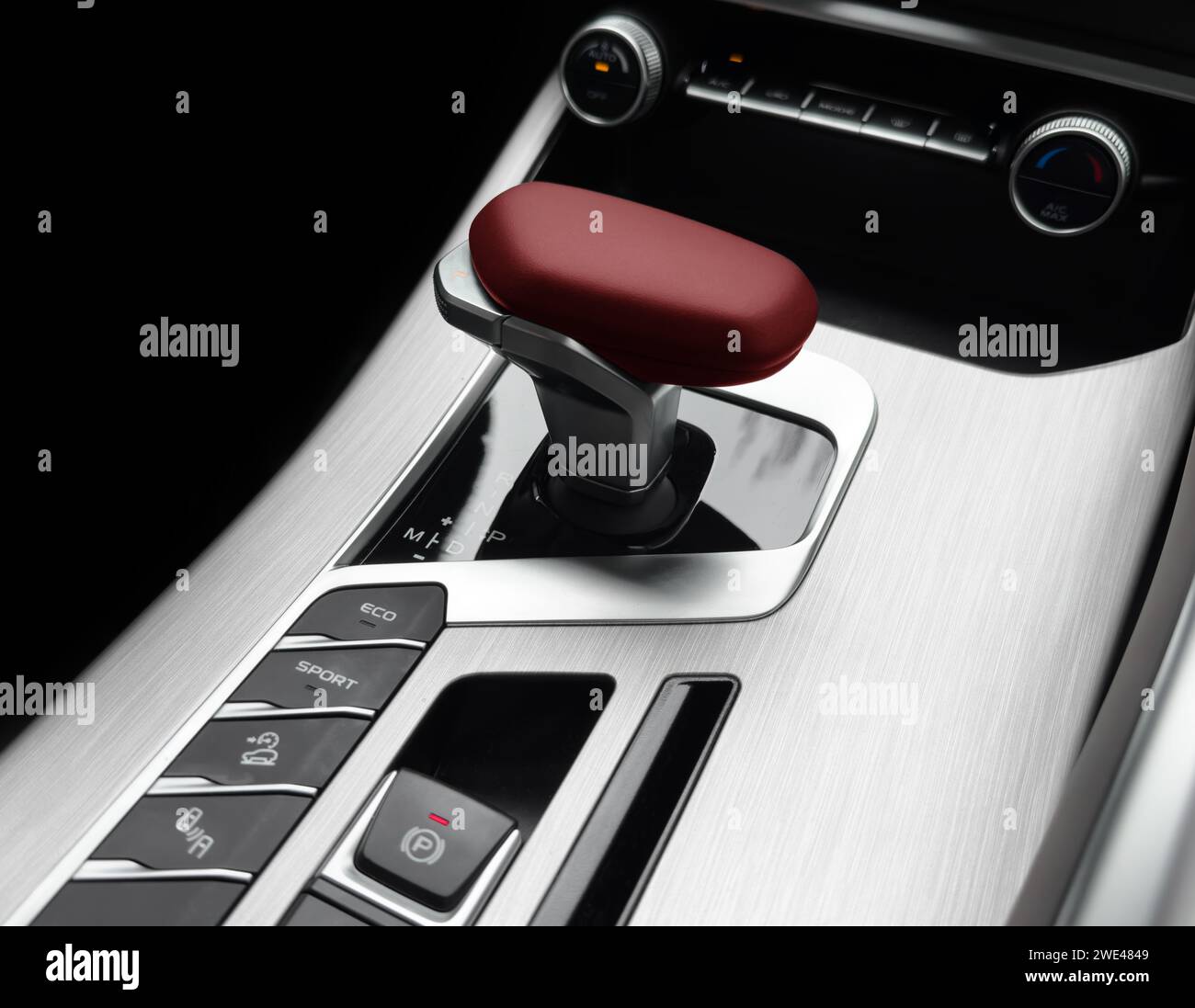 Automatic gear stick of a modern car. Modern car interior details ...