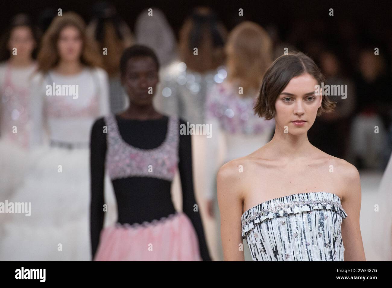 Paris, France. 23rd Jan, 2024. Models walk the runway during the Chanel ...