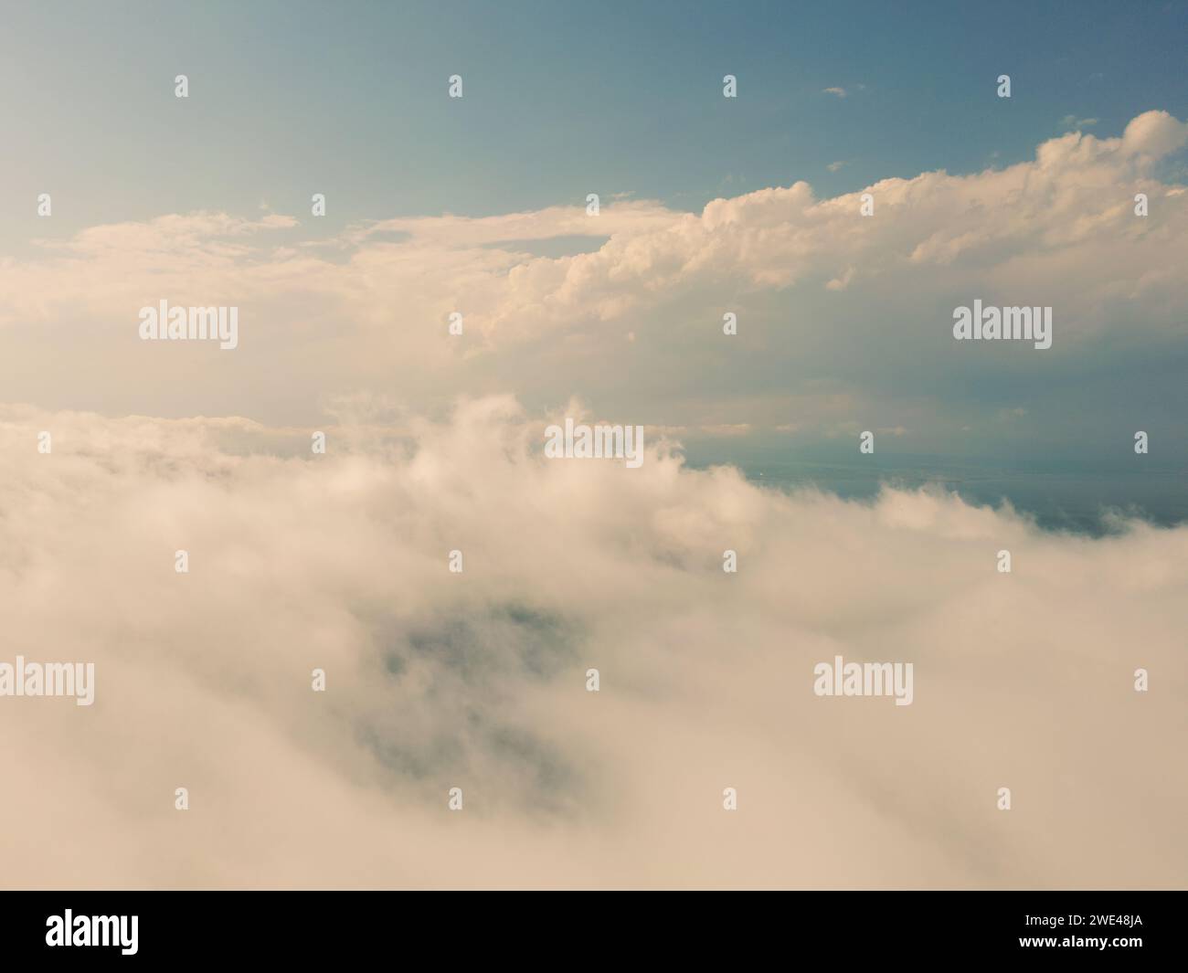 Aerial view White clouds in blue sky. Top. View from drone. Aerial bird ...