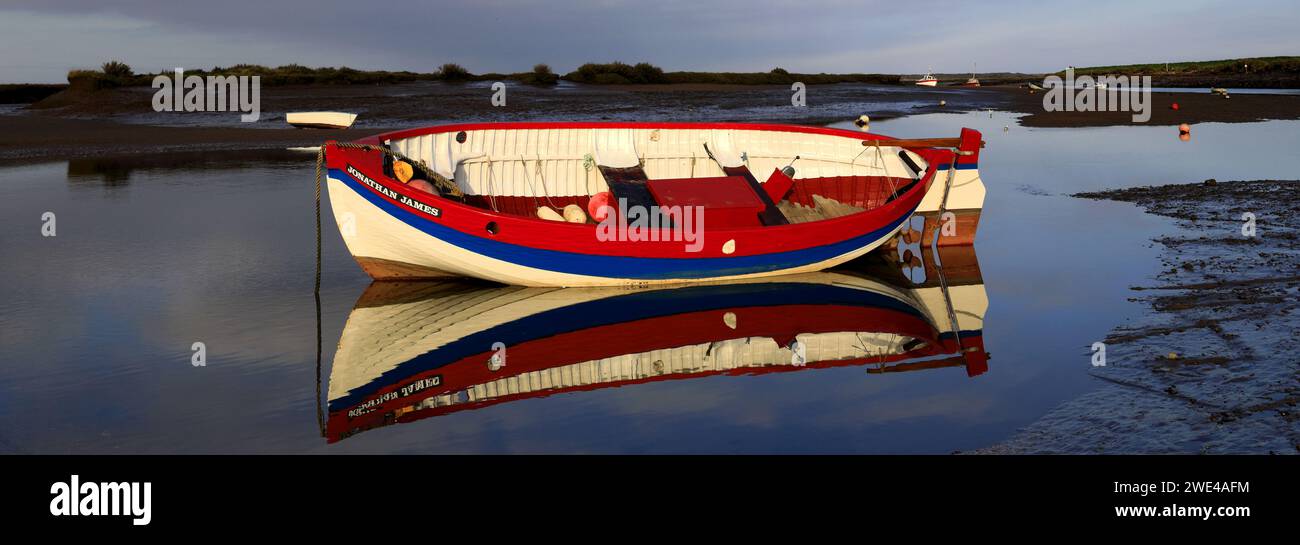 Fishing boat in the estuary at Burnham Overy Staithe village, North ...