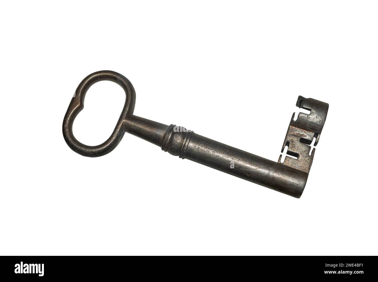 Antique iron key isolated Stock Photo - Alamy
