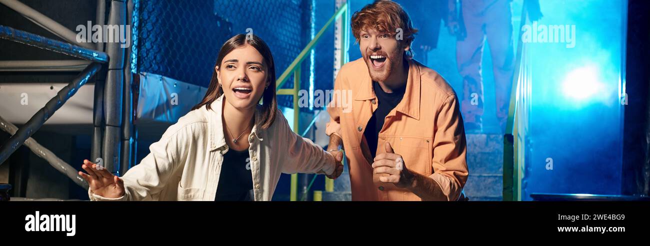 Running night scared couple hi-res stock photography and images - Alamy