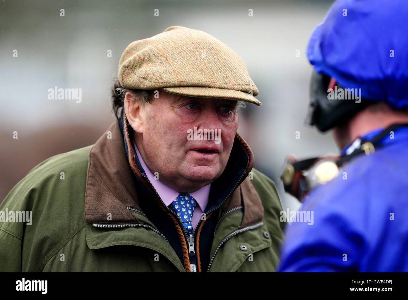 Trainer Nicky Henderson speaks to jockey Nico de Boinville at Newbury ...