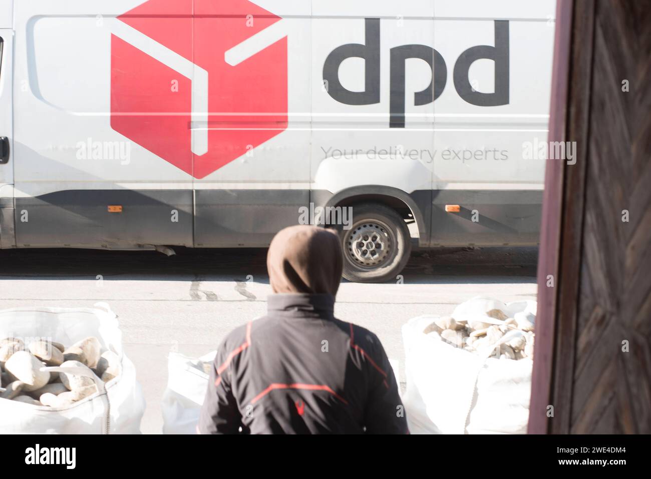 a DPD truck on the street delivering mail and parcels DPD truck ...