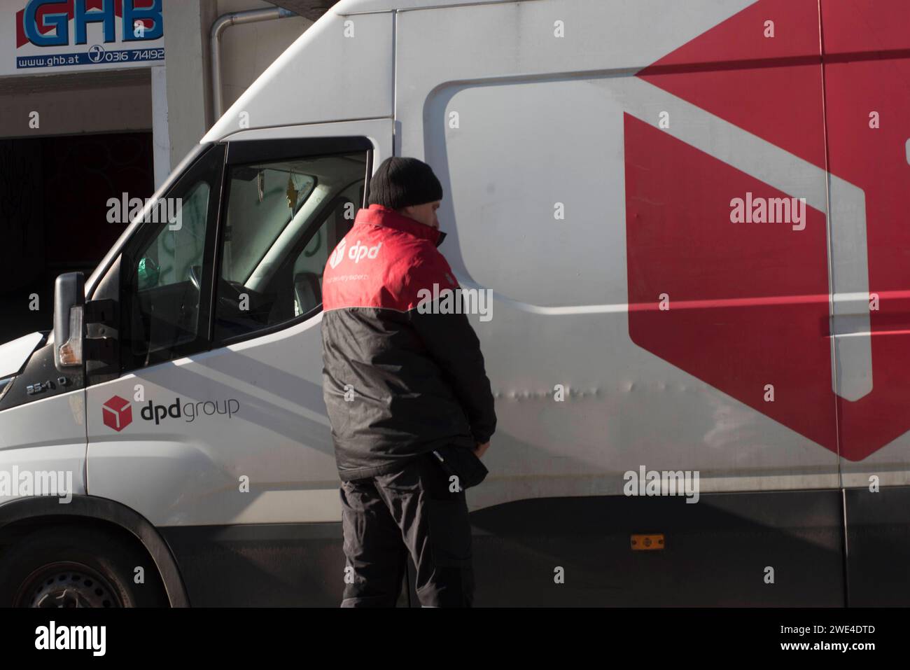a DPD truck on the street delivering mail and parcels DPD truck ...