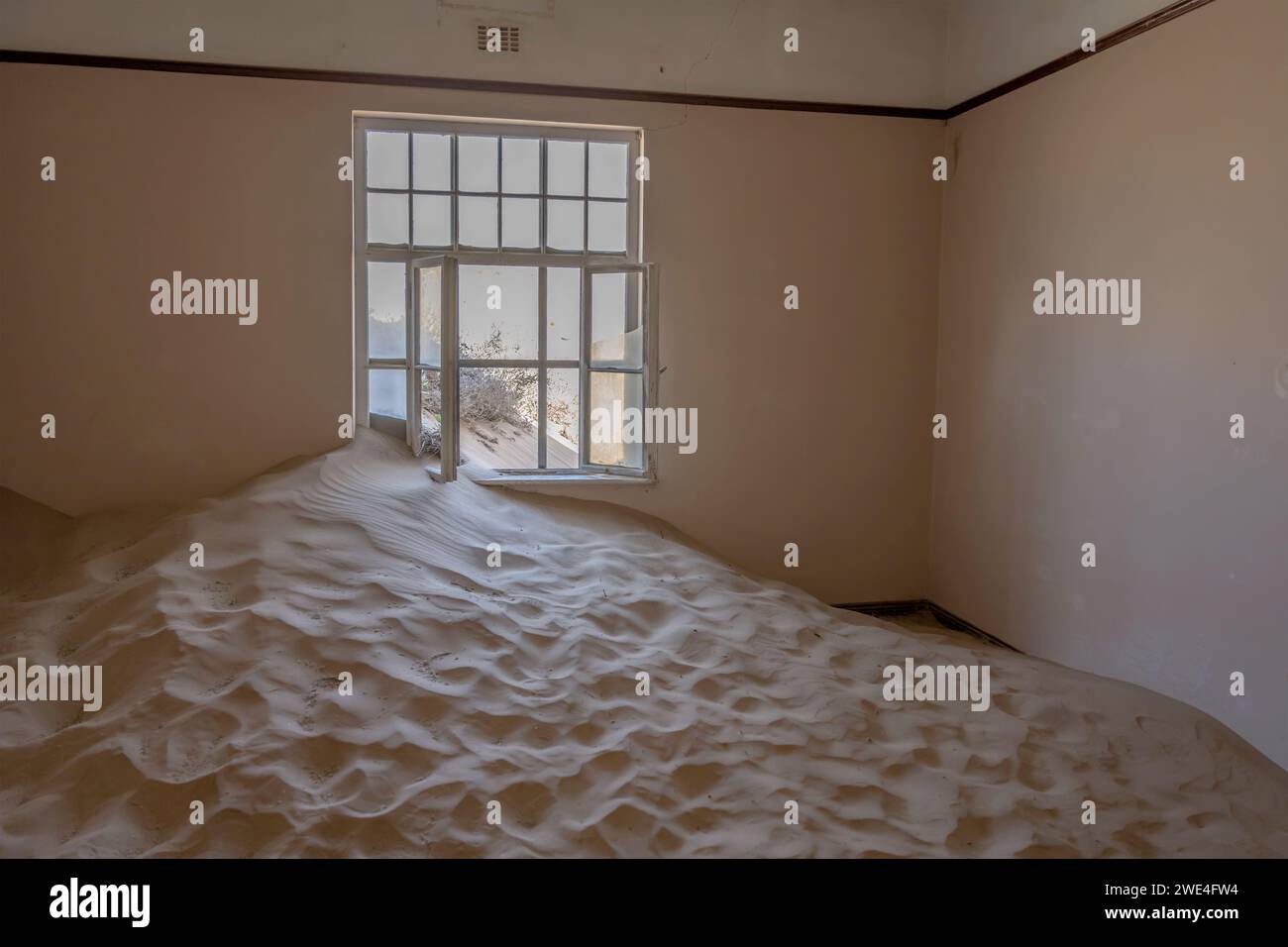 desert sand entering room of forsaken hospital building at mining ghost ...