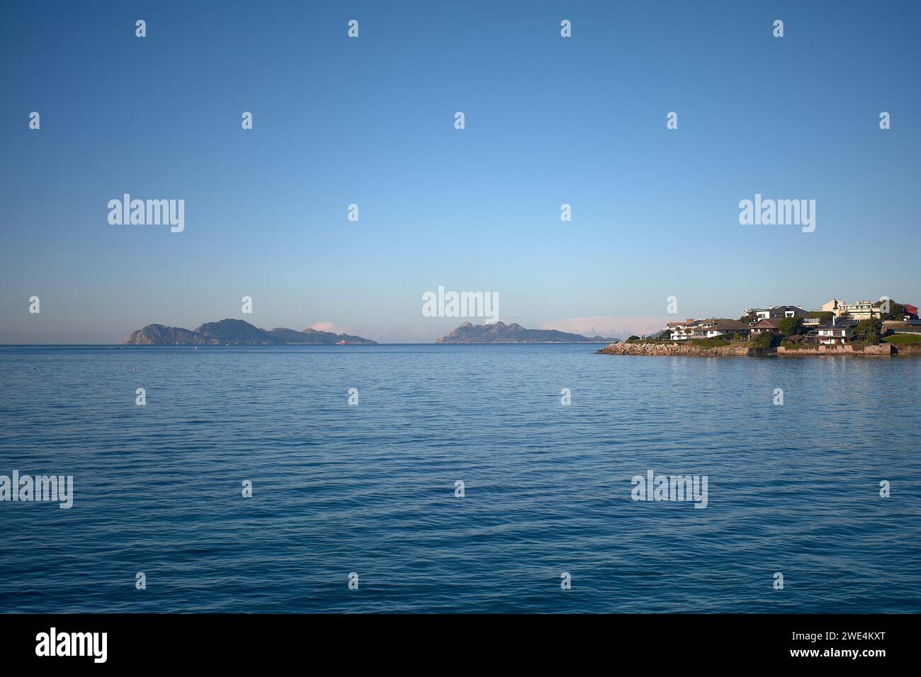 The Cies Islands seen from Canido in Vigo, with a blue sea and the ...