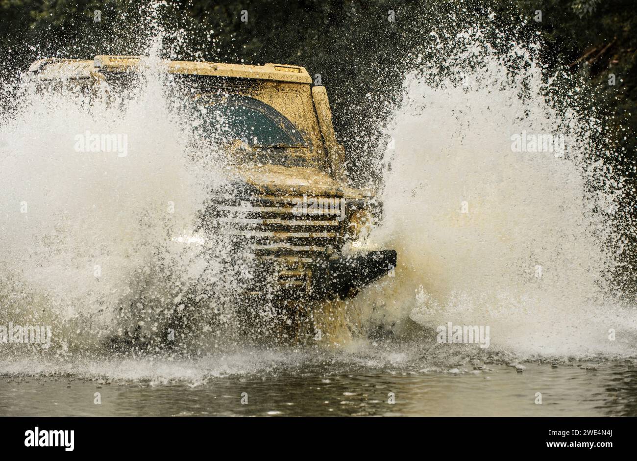 Off-road vehicle goes on the mountain. Tires in preparation for race ...