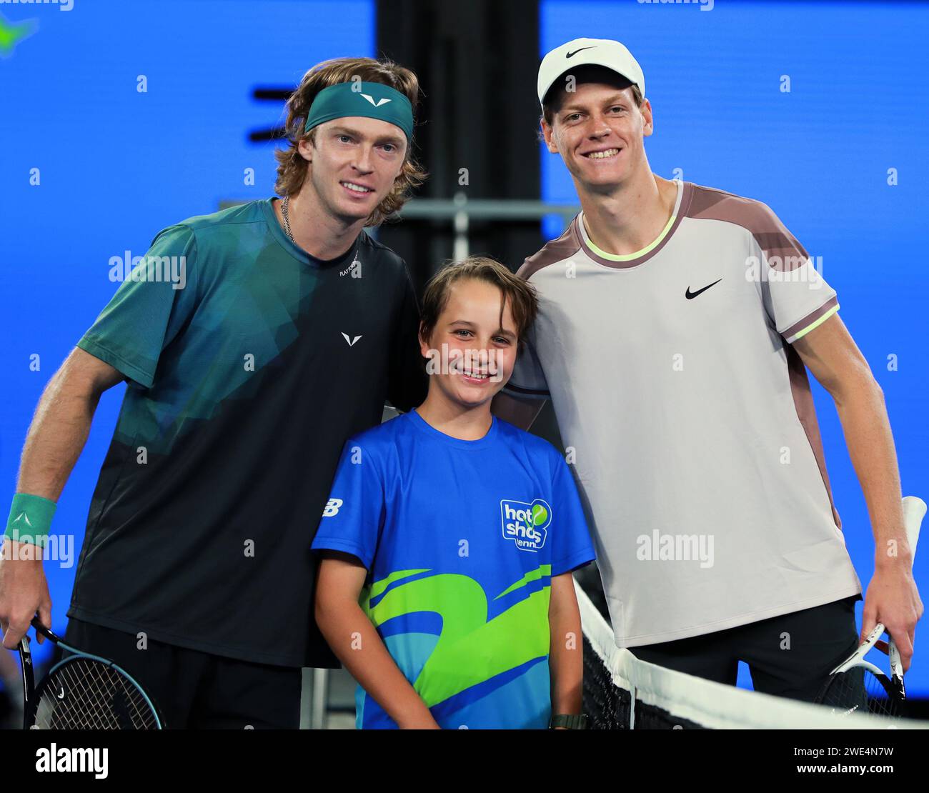 Melbourne, Australia. 23rd Jan, 2024. Jannik Sinner (R) and Andrey Rublev (L) pose with a ball ...
