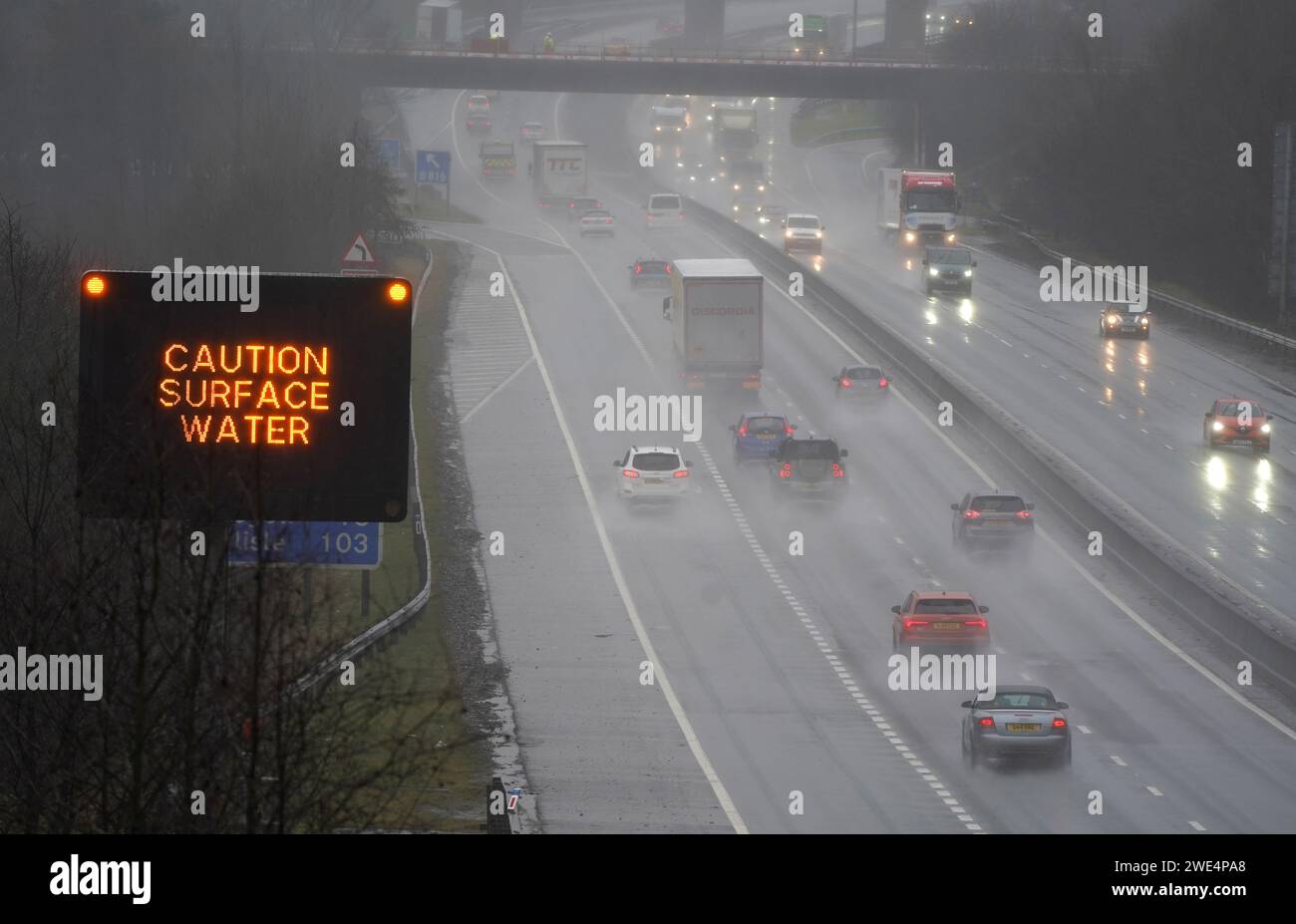 Vehicles make their way through heavy rain on the M80 near Banknock as ...
