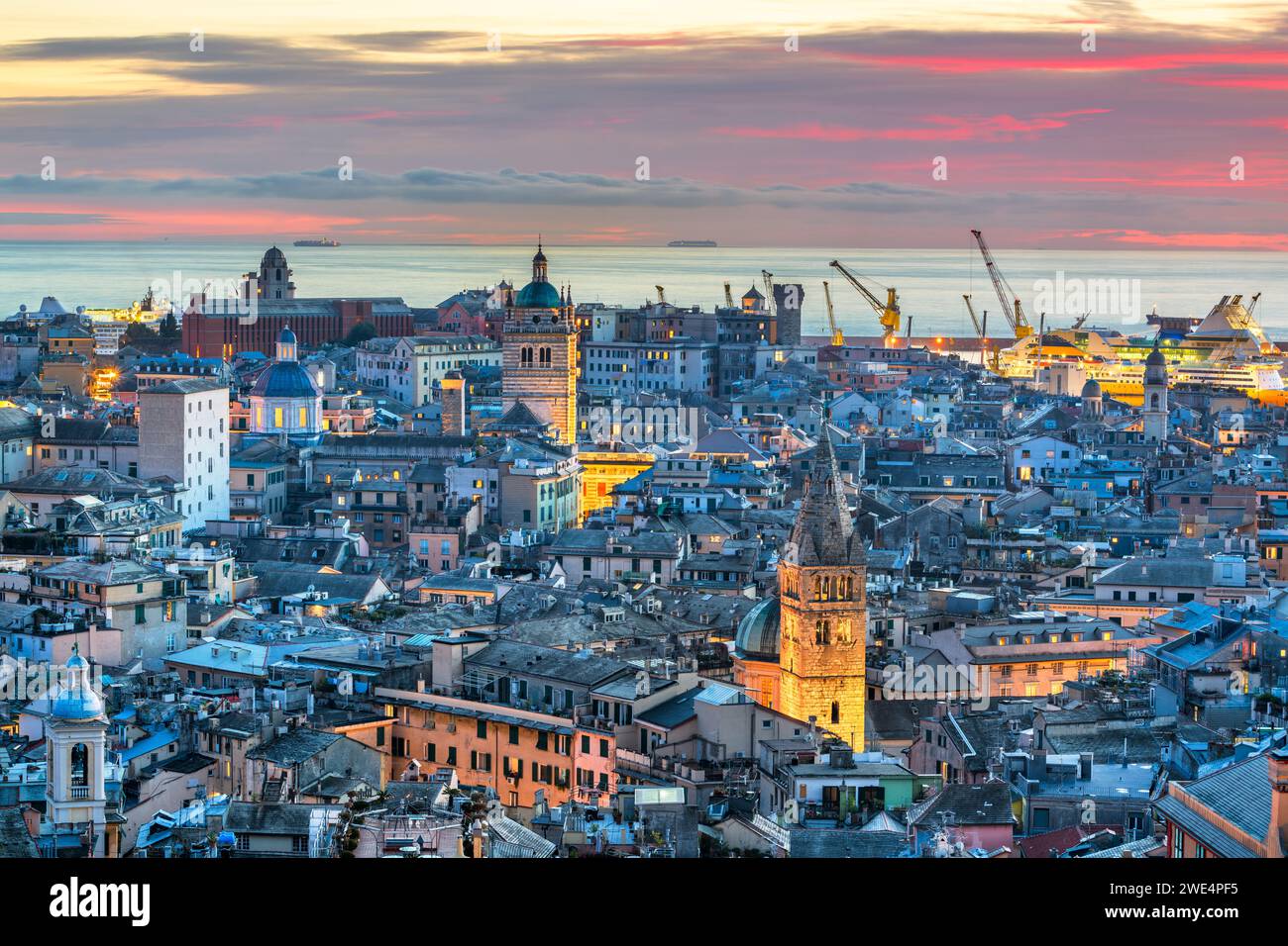 Genova, Italy downtown skyline with historic towers at dusk Stock Photo ...