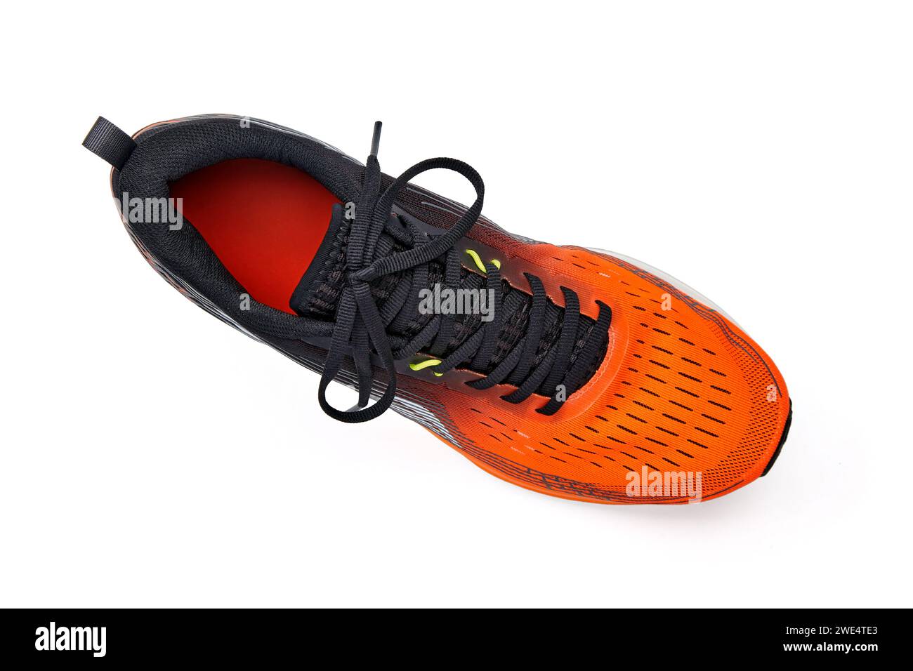 Right orange running shoe isolated on white background. Top view with ...