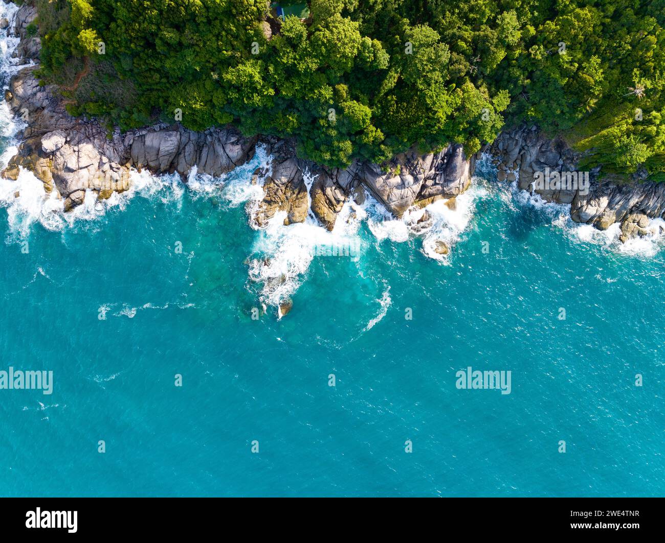 Bird eye view seashore with big wave crashing on rock cliff. Beautiful ...