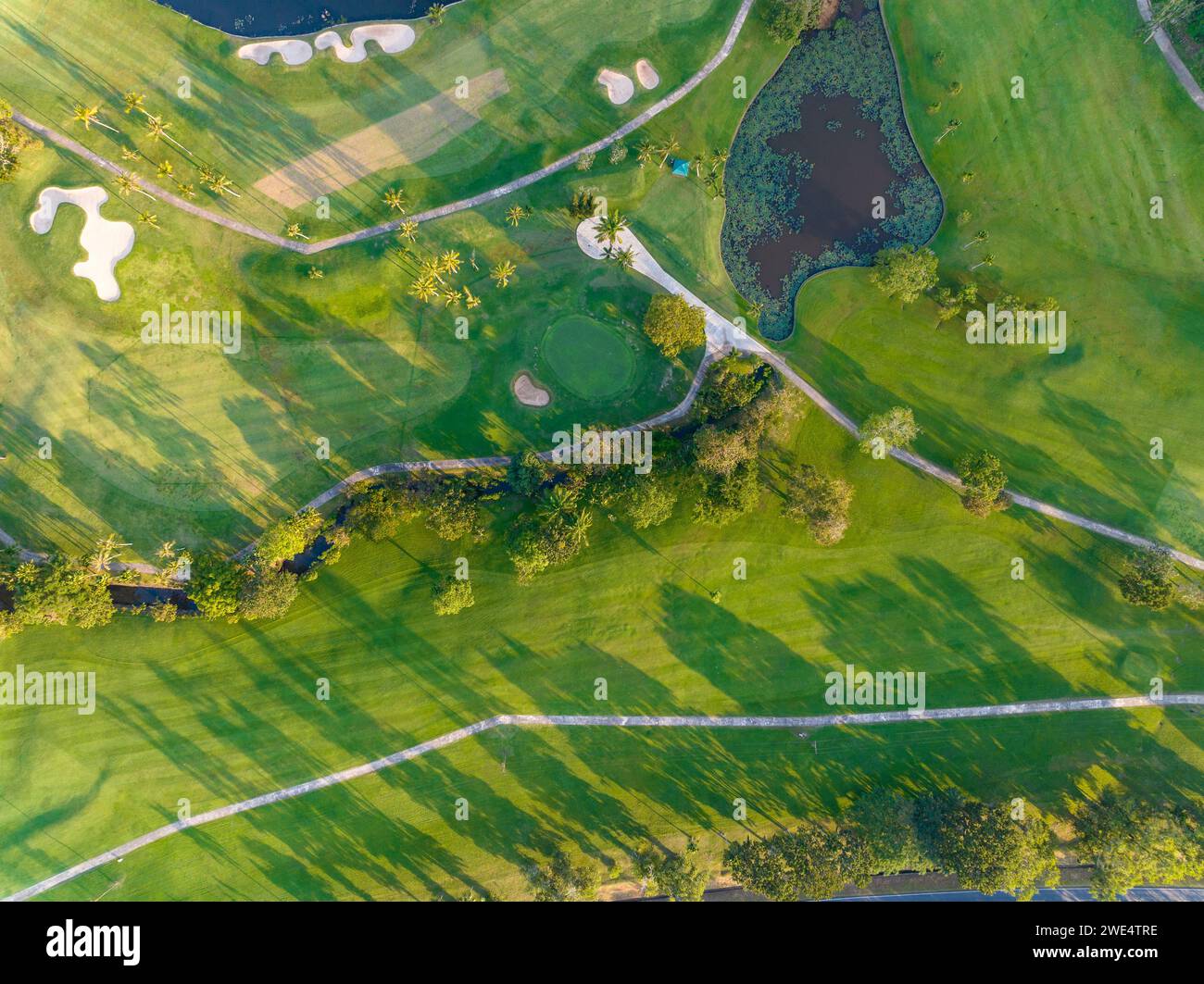 Aerial view of beautiful green golf field fairway and putting green ...