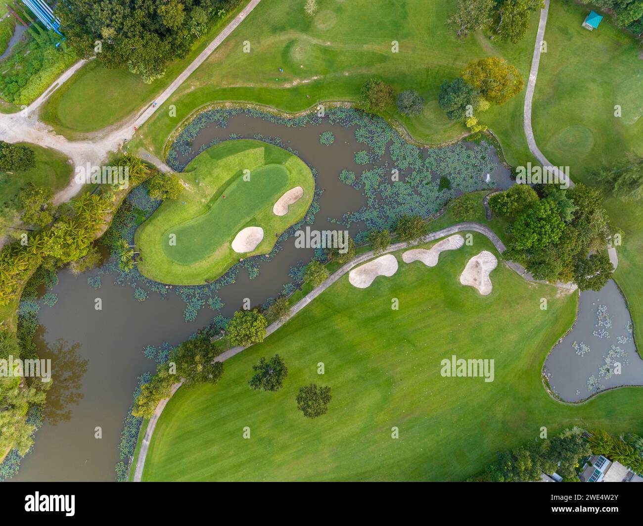 Aerial view of beautiful green golf field fairway and putting green ...