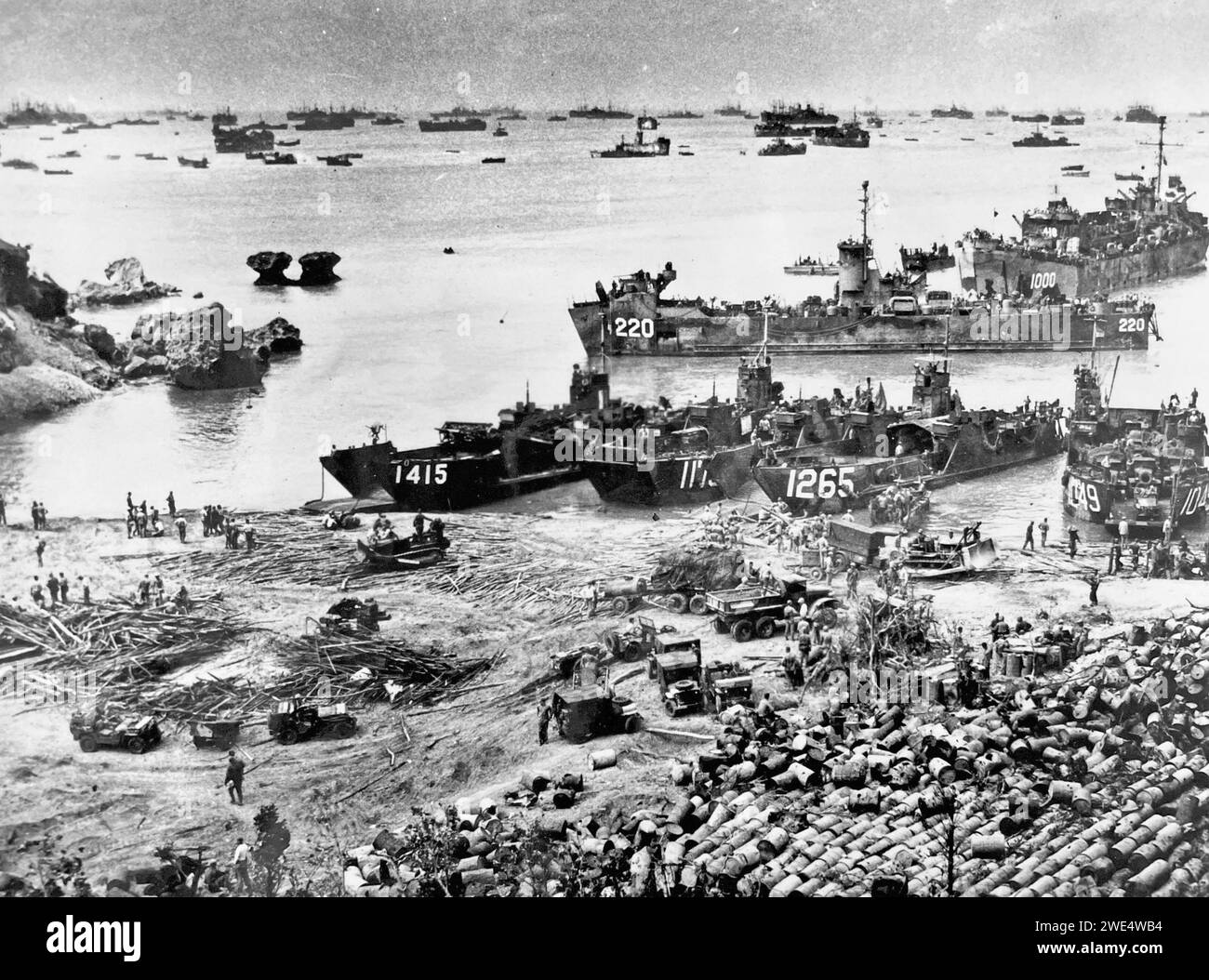 BATTLE OF OKINAWA April-June 1945. Americans landing supplies to backup ...