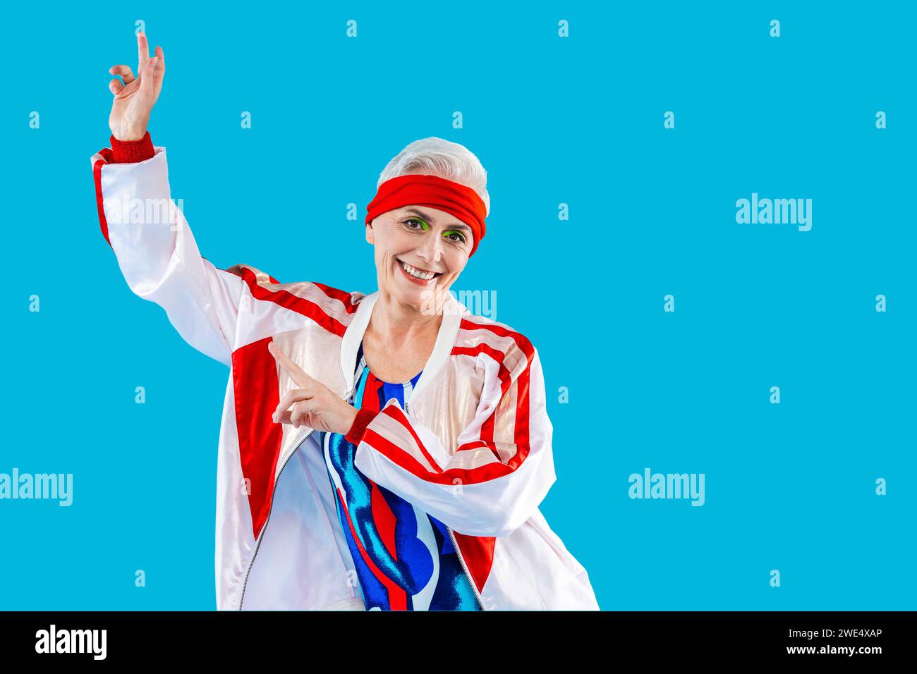 Happy and funny senior old woman wearing sportswear clothing on ...