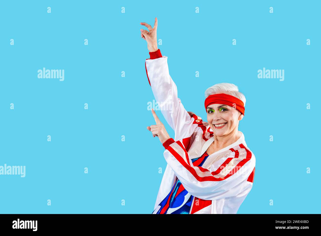 Happy and funny senior old woman wearing sportswear clothing on ...