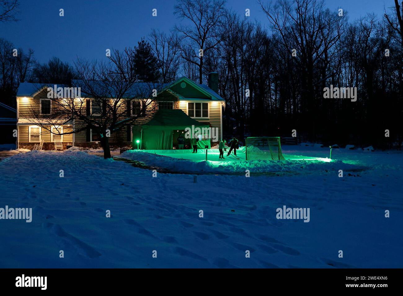Michael Lamia, 6, and Olivia Romero, 10, (right) practice their hockey ...