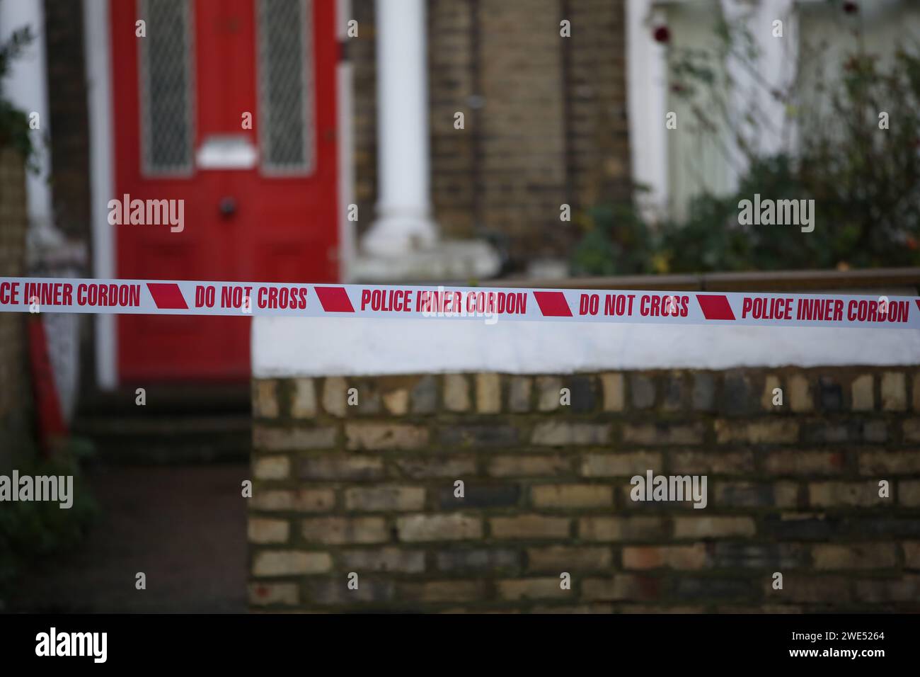 A police tape seen at the crime scene in London Stock Photo - Alamy