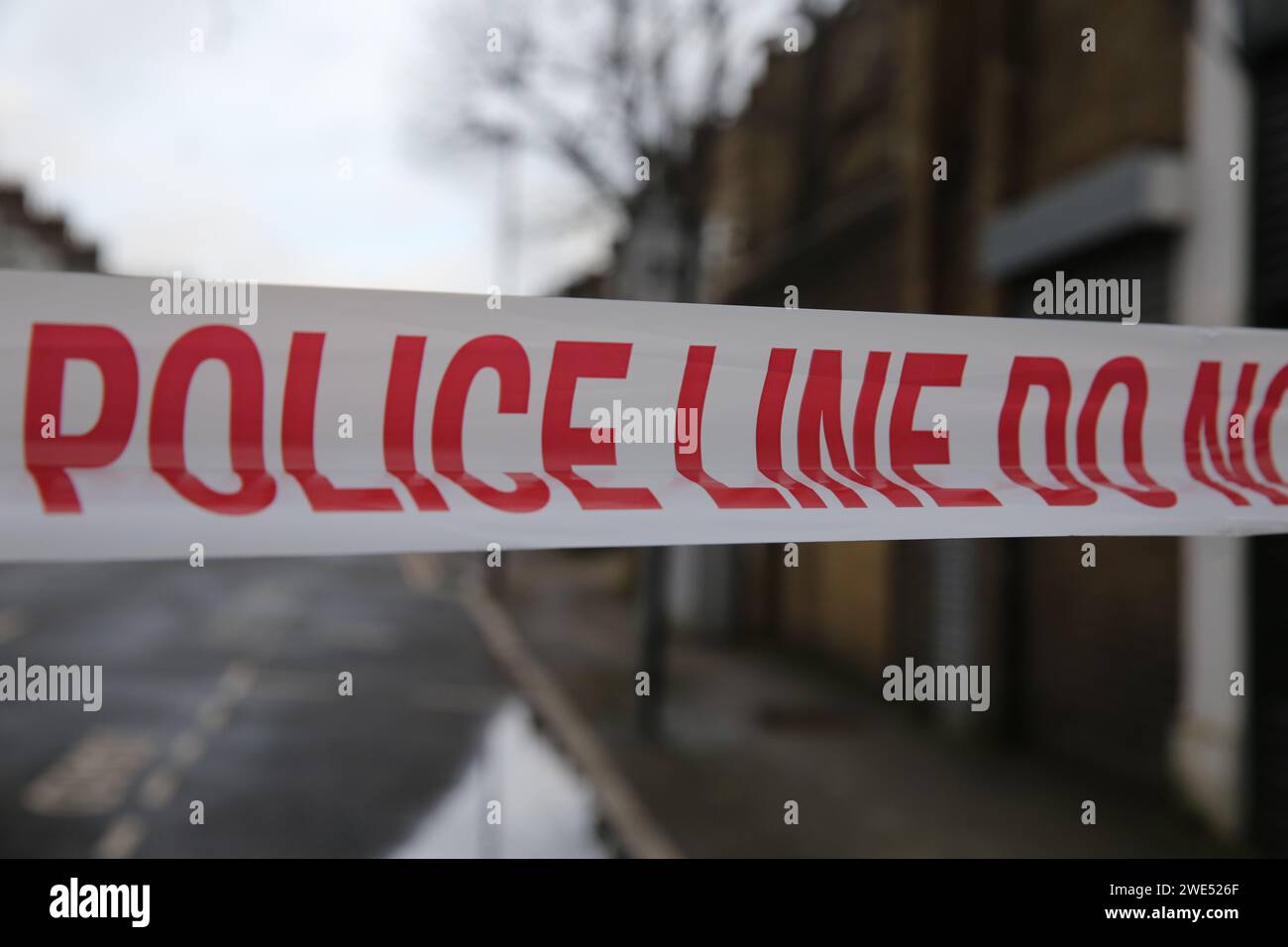 A police tape seen at the crime scene in London Stock Photo - Alamy