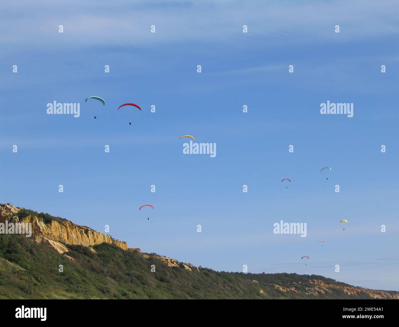 Paragliding in the Fonte da Telha beach, a popular location for ...