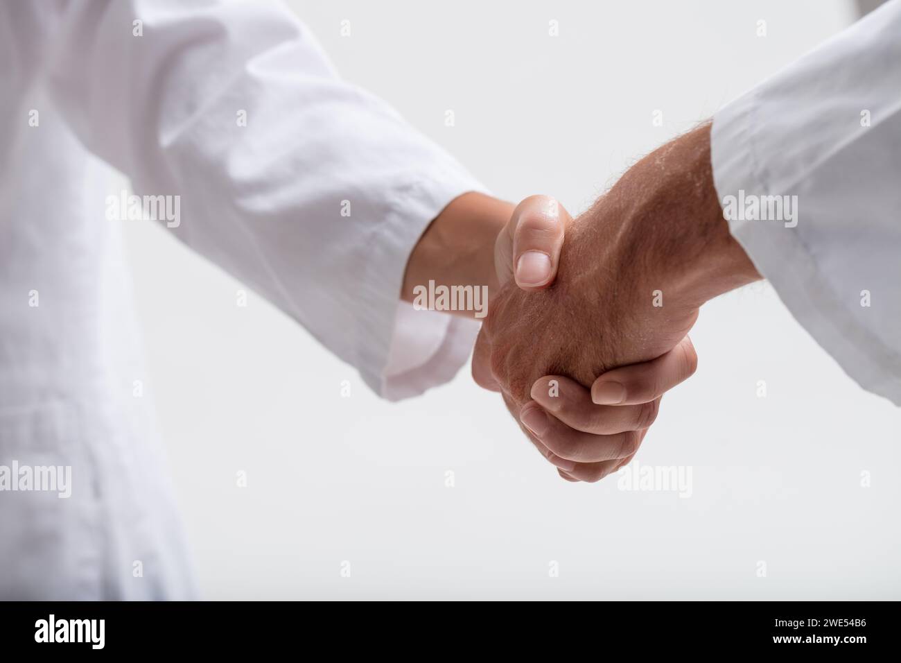 patient's hand grasped in support signals comfort amidst despair, a ...