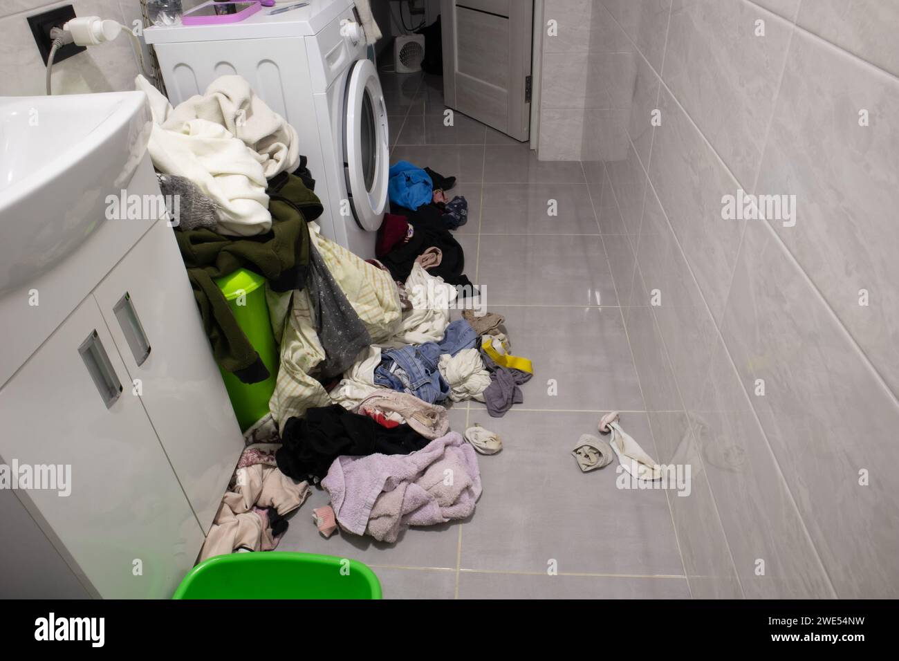 Scattered clothes floor hi-res stock photography and images - Alamy