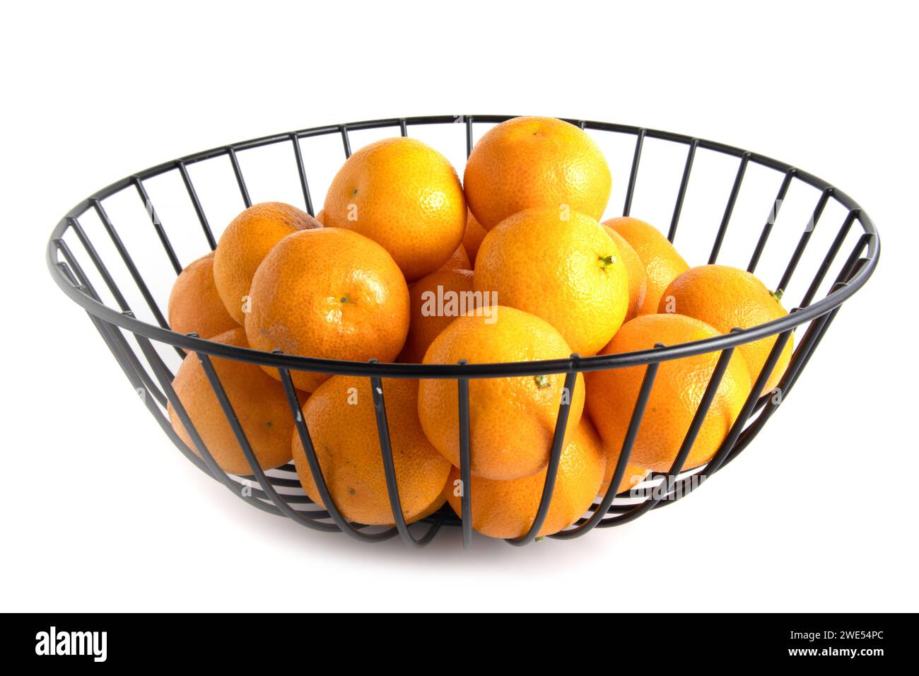 Tangerines in a metal mesh fruit bowl on a white background Stock Photo ...