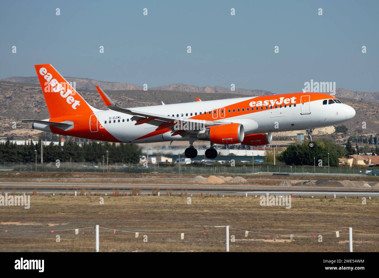 Low-cost airline Easyjet Airbus A320 airliner landing in Alicante Stock ...