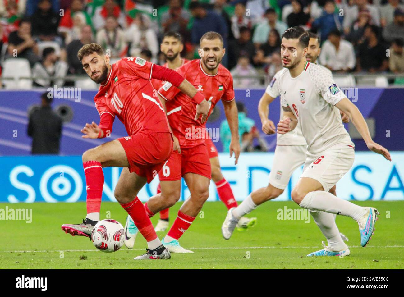 Al Rayyan, Qatar. 14th Jan, 2024. Zaid Qunbar of Palestine and Saeid ...