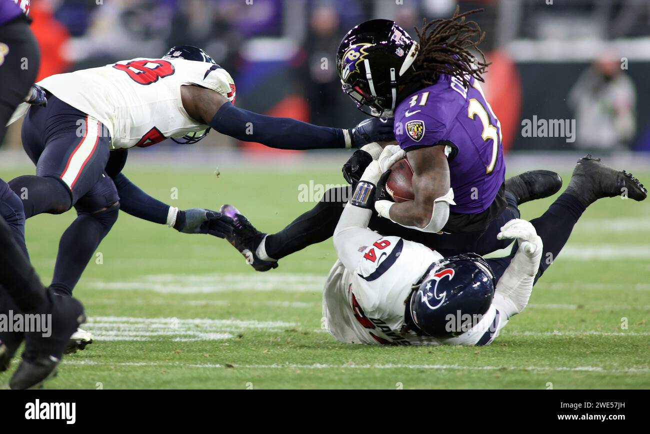Baltimore Ravens running back Dalvin Cook (31) gets taken down by ...