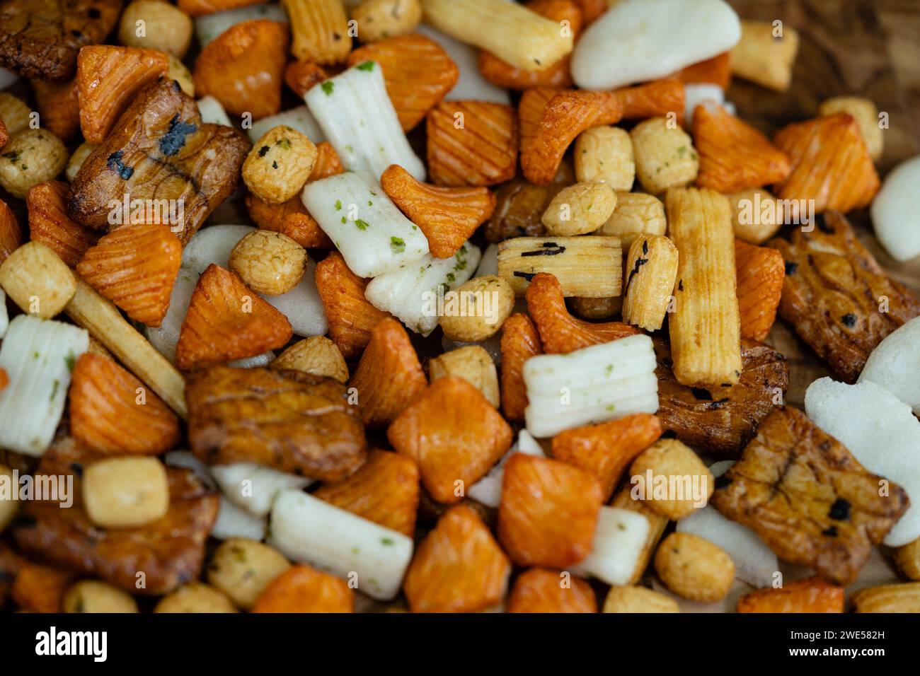 Different types of Japanese rice cakes on olive wood Stock Photo - Alamy