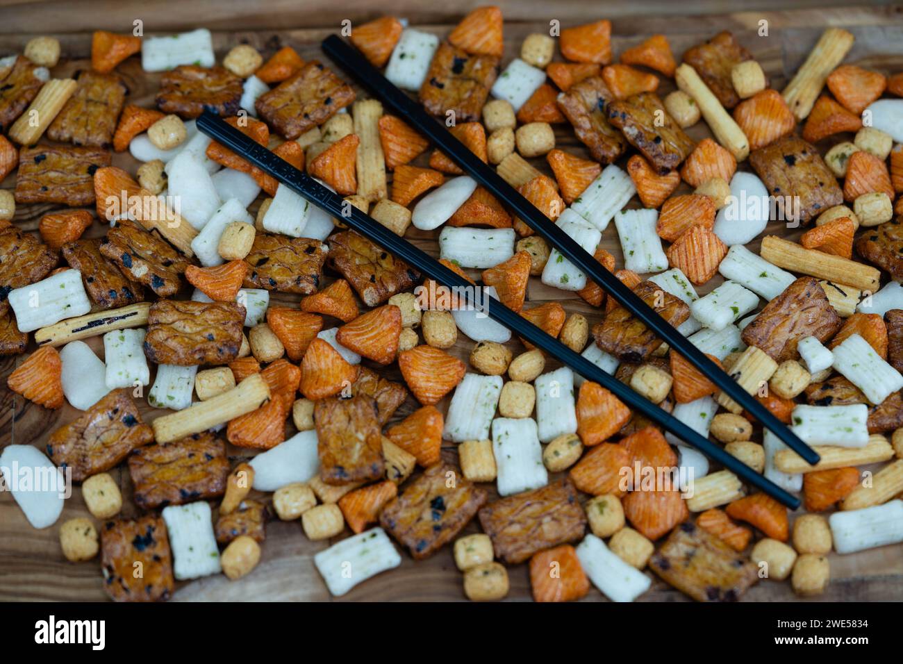 Different types of Japanese rice cakes on olive wood Stock Photo - Alamy