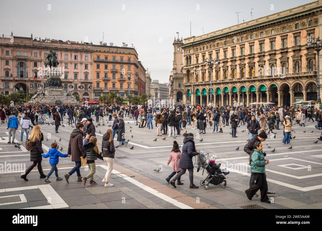 Families and tourists crowd into Duomo Square outside the Duomo, or ...