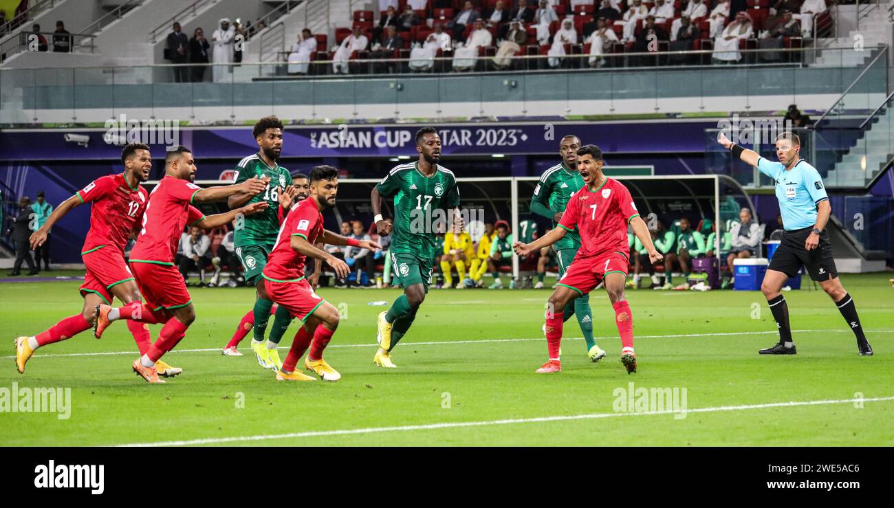 Doha, Qatar. 16th Jan, 2024. Salah Al-Yahyaei (20) of Oman celebrates ...