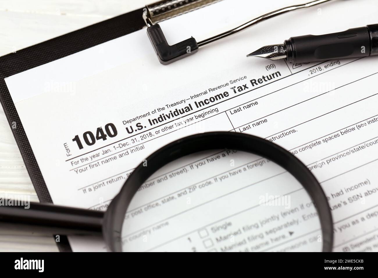 Form 1040 US Individual Income Tax Return on A4 tablet lies on office ...