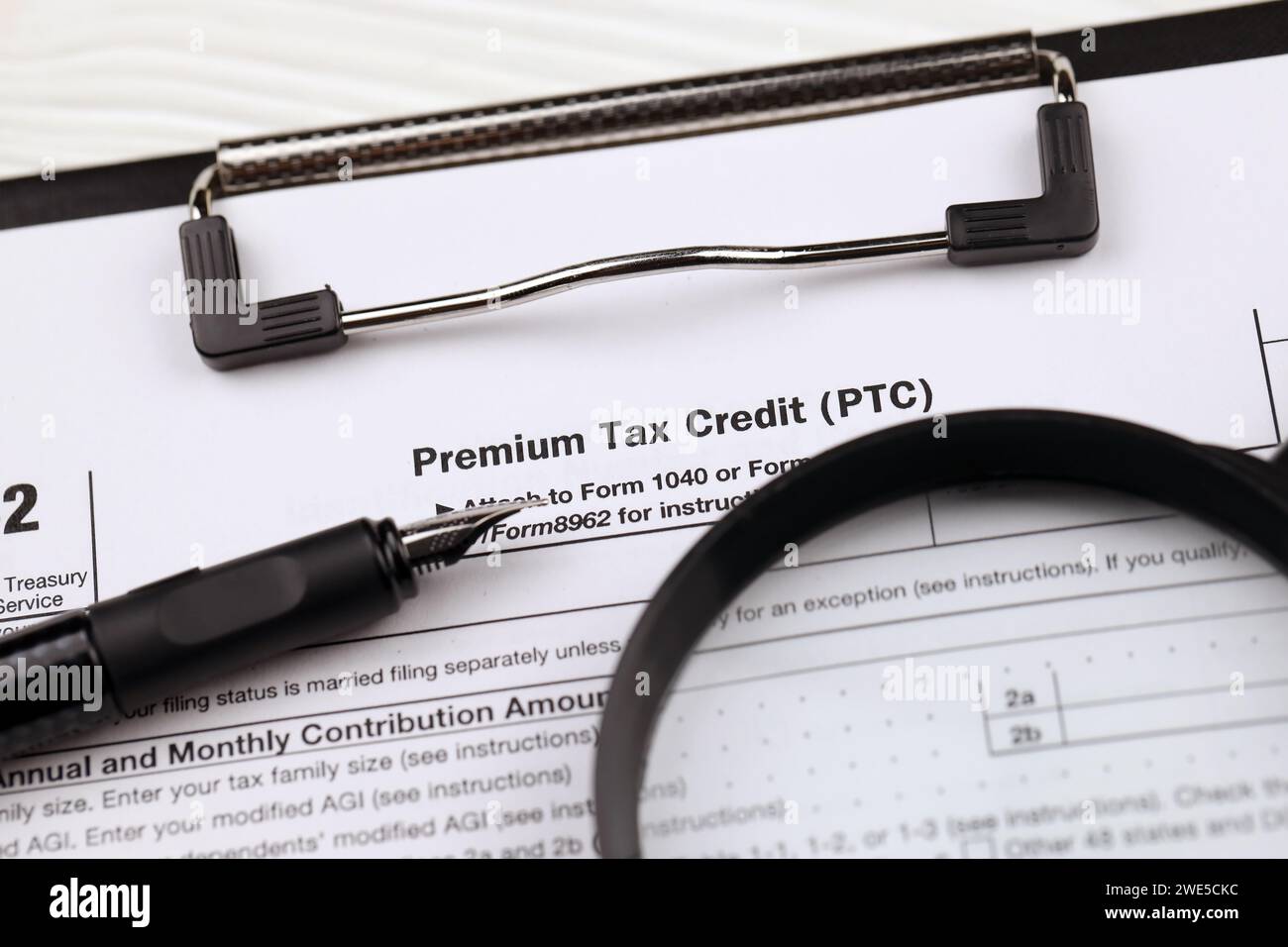 IRS Form 8962 Premium tax cerdit PTC blank on A4 tablet lies on office ...