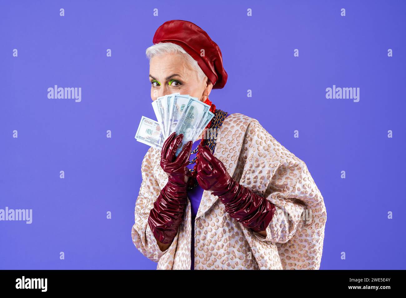 Happy and funny senior old woman wearing fashinable clothing on ...