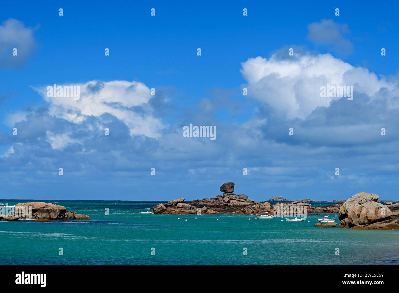Rock formations on the coast with boats, Trégastel, Côte de Granit Rose ...