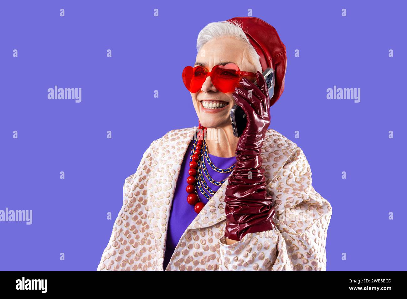 Happy and funny senior old woman wearing fashinable clothing on ...