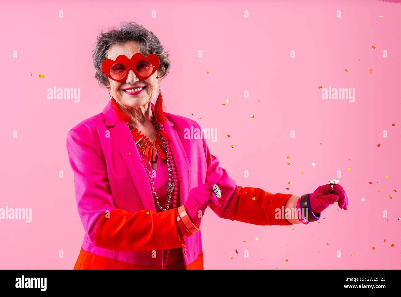 Happy and funny senior old woman wearing fashinable clothing on ...