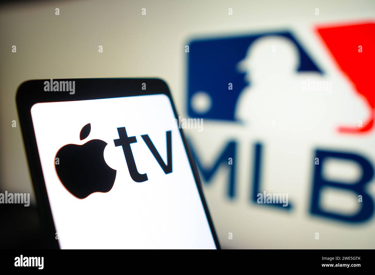 In this photo illustration, the Apple TV logo is displayed on a ...