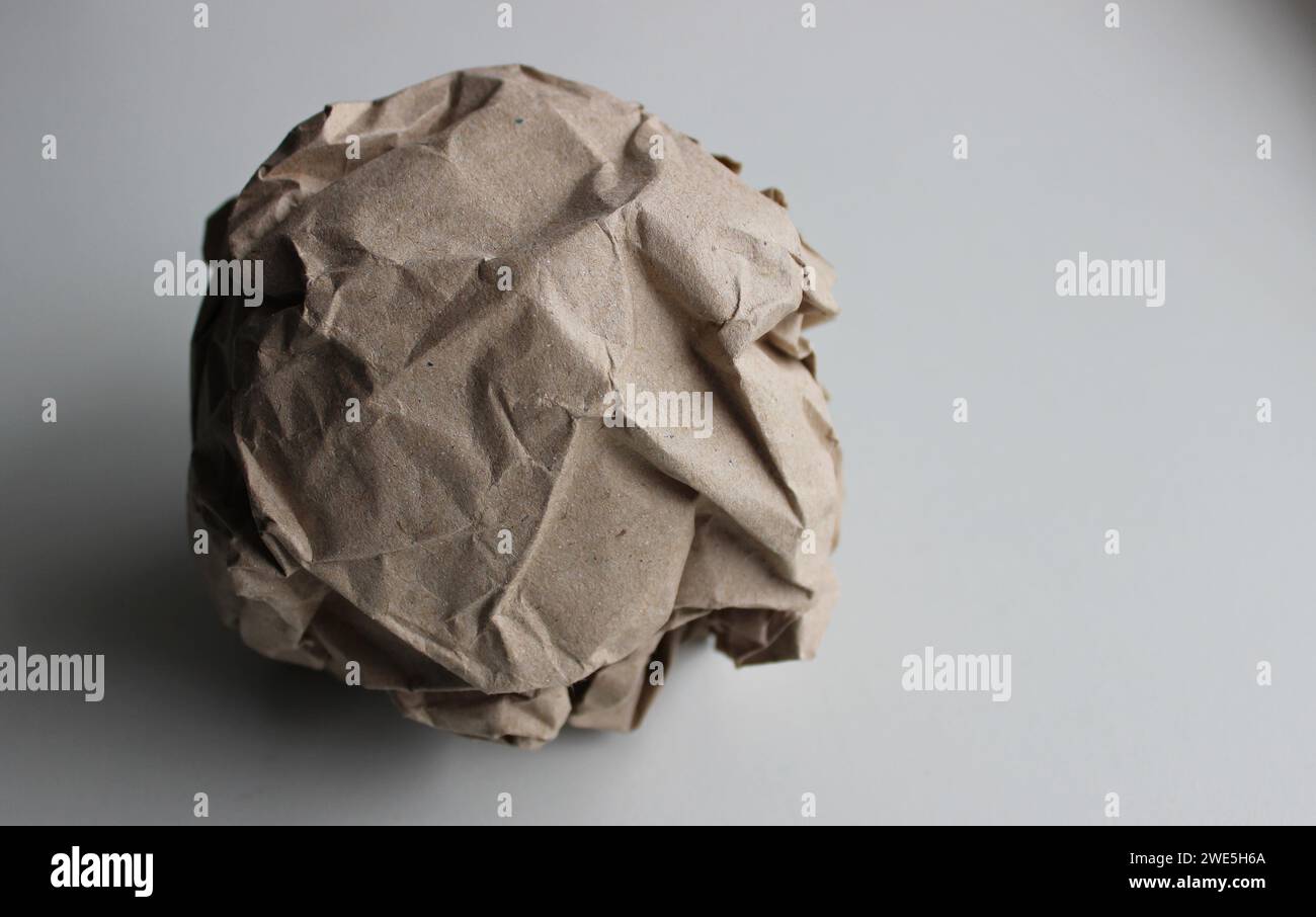 Roll of crumpled wrapping paper black and white photo Stock Photo - Alamy