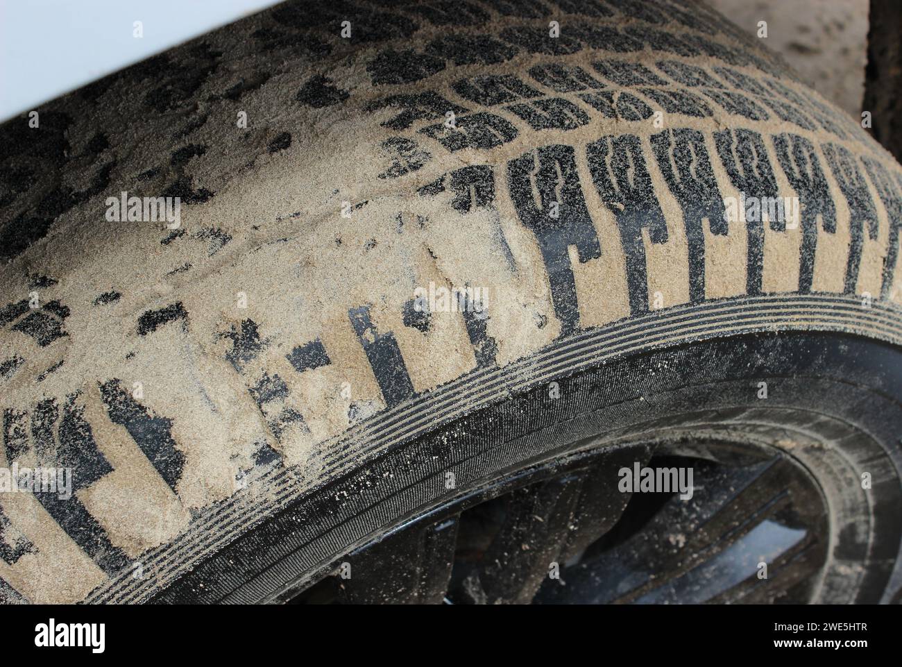 Traction control trouble. Tread pattern of tire packed with sand after ...