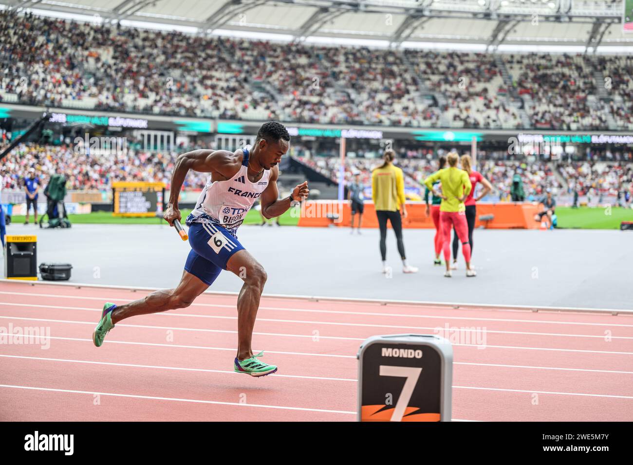 Gilles BIRON participating in the 4x400 m Relay at the World Athletics ...