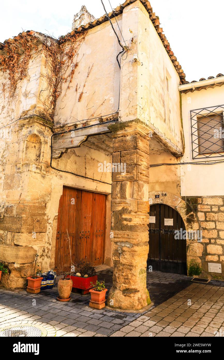 Priego, Cuenca, Spain- December 10, 2023: Cobbled streets and Facades ...