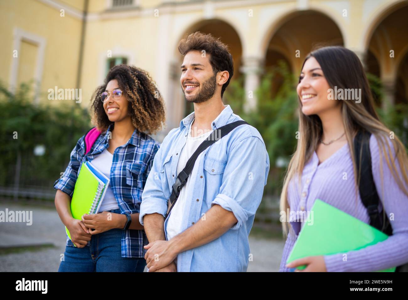 Group of college students in front of their school Stock Photo - Alamy
